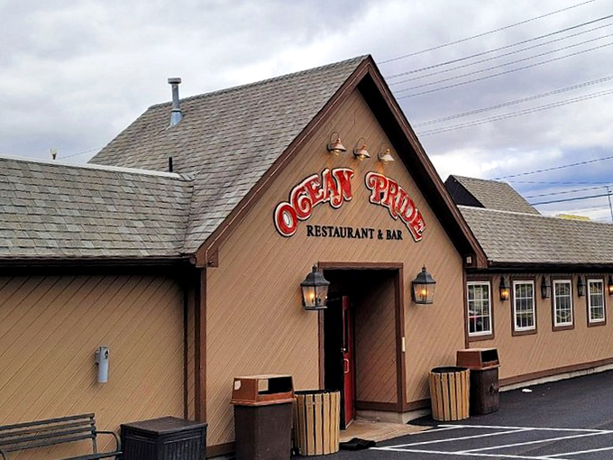 Ocean Pride's rustic wooden exterior houses seafood treasures within. That sign promises exactly what it delivers&mdash;pride in every oceanic bite.
