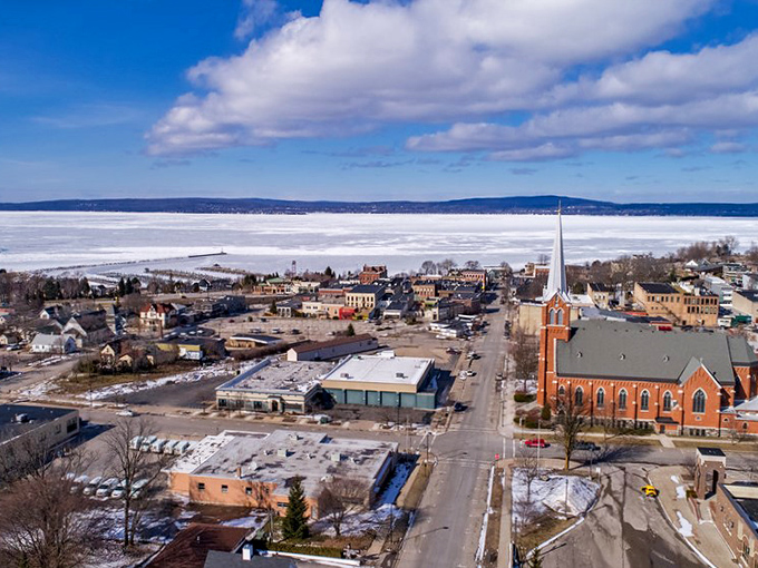 Petoskey in winter transforms into a snow globe scene, with its harbor frozen in a beautiful, icy stillness.