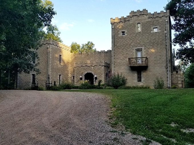 Ravenwood Castle appears through the trees like a bedtime story come to life. Cinderella would upgrade her cottage for this!
