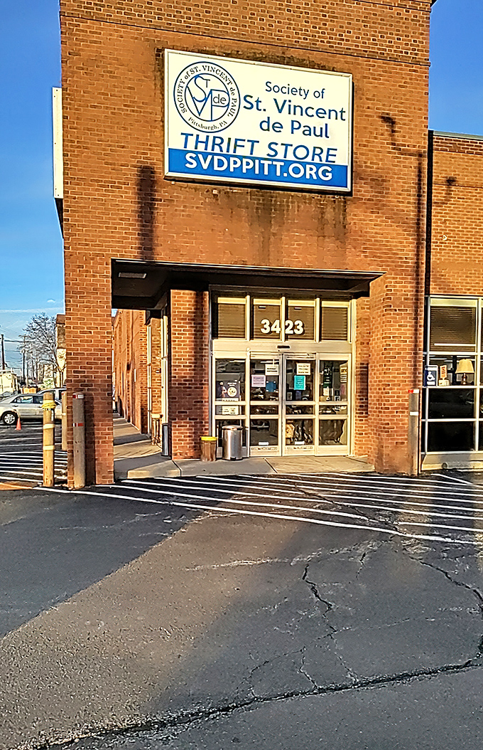 St. Vincent de Paul's brick building has the dignified look of a place with history. Those windows display treasures waiting for their second chance.