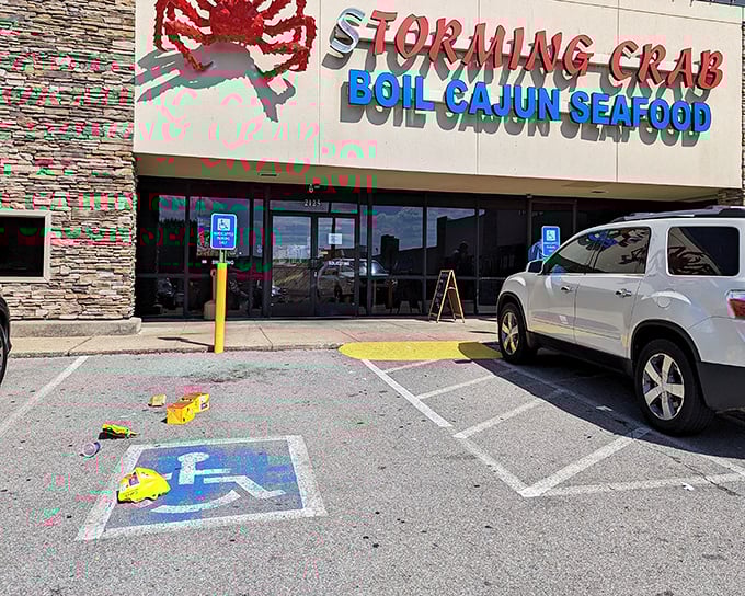 Storming Crab's bold red crustacean sign isn't just announcing a restaurant&mdash;it's warning you that a delicious seafood hurricane is about to hit!