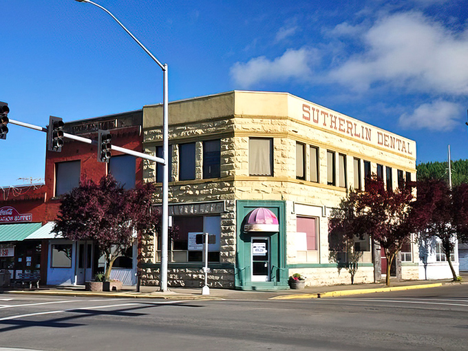 Sutherlin's historic stone building stands proudly on the corner, housing modern businesses in timeless architecture.