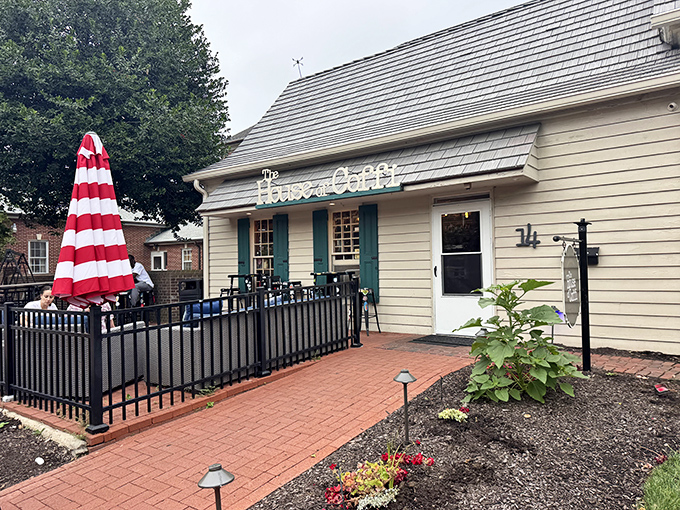 The House of Coffi's charming colonial exterior hints at the perfect blend of historic charm and modern coffee craftsmanship waiting inside.