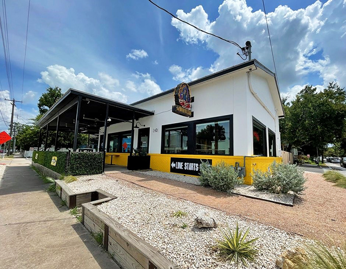 La Barbecue's bright white building with sunny yellow trim feels like a party. The sign doesn't lie&mdash;that line is definitely worth joining.