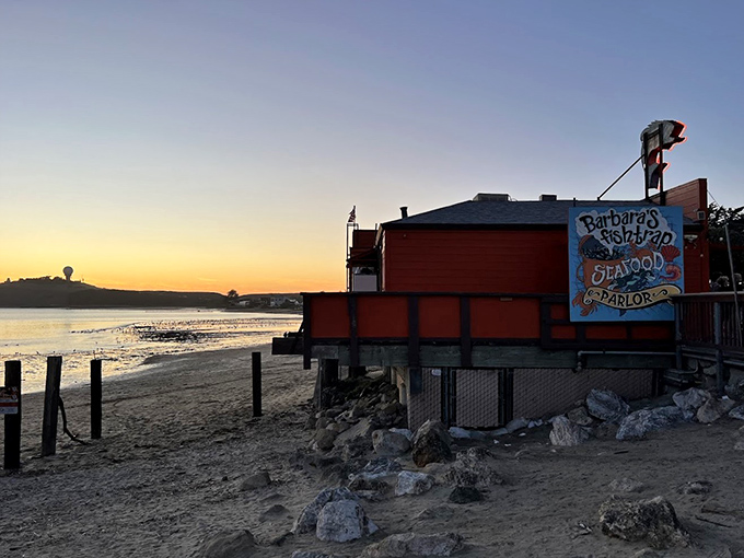 Sunset casts a golden glow on Barbara's Fishtrap's rustic exterior. This Half Moon Bay legend has been serving seafood epiphanies with a side of ocean views for decades.