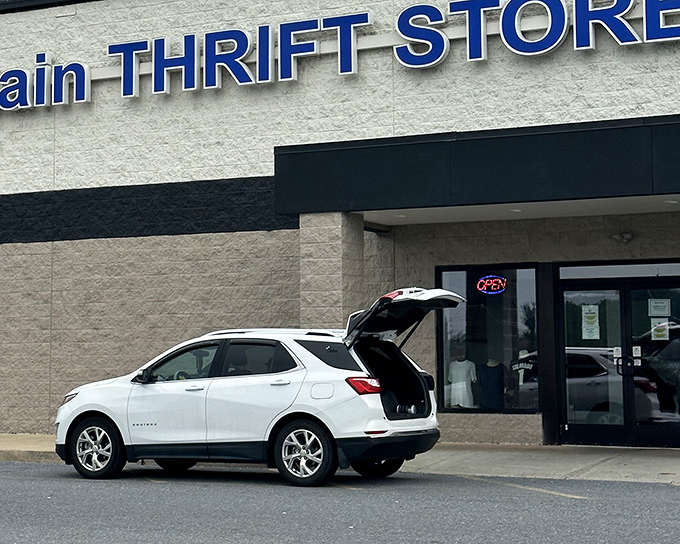 That open trunk says it all - someone's about to score big at Blue Mountain Thrift. Will you be next?