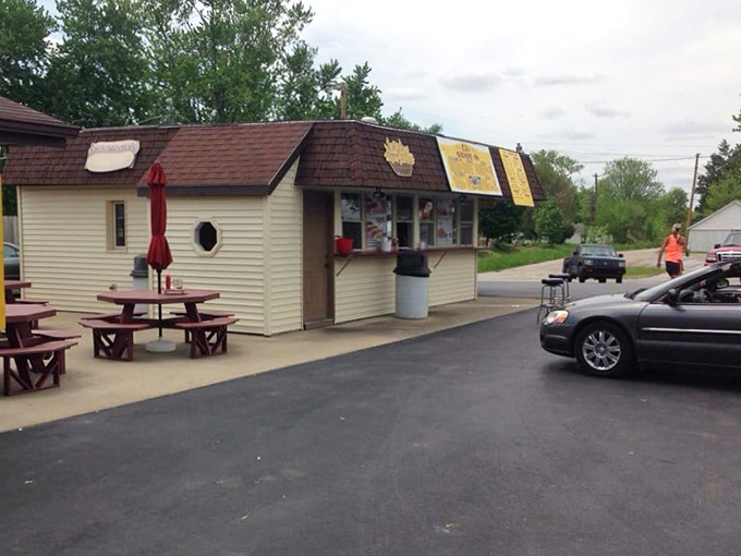 The cheerful yellow sign welcomes Columbia City folks like an old friend waving from the roadside.