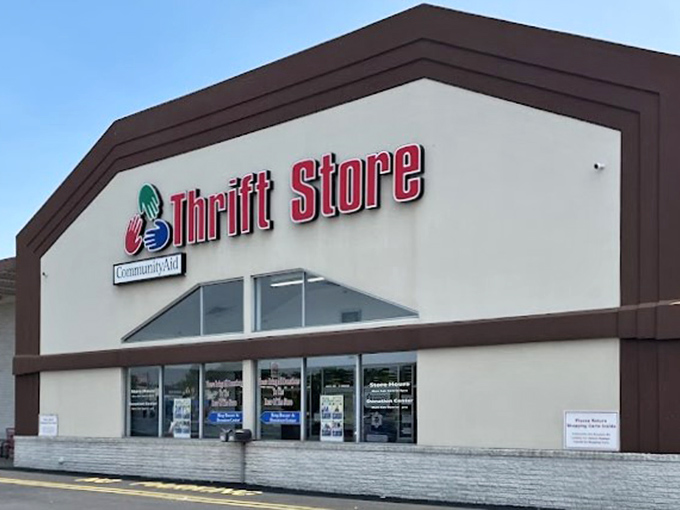 The classic thrift store signage of CommunityAid promises a traditional treasure-hunting experience with a charitable heart.