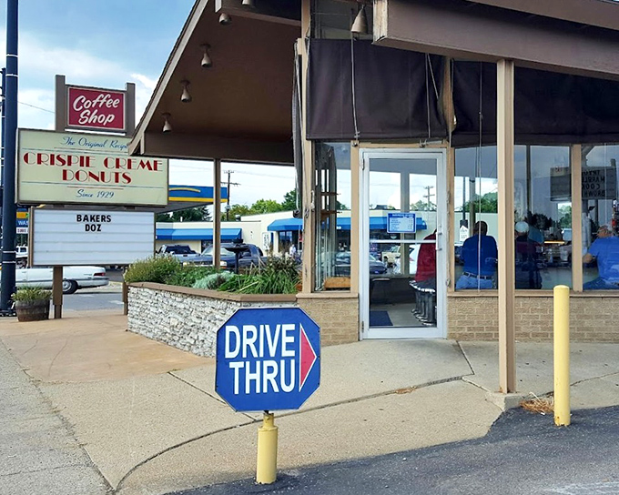 The drive-thru sign at Crispie Creme offers the ultimate convenience: donuts without leaving your car!