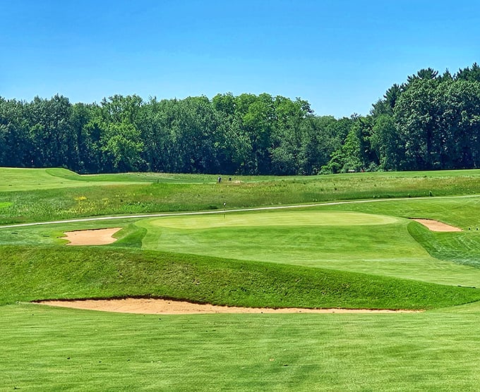 The manicured greens of this golf course near Green Lake offer both challenging play and spectacular views &ndash; golfer's paradise in the heartland.