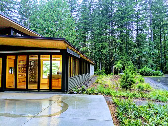 A modern visitor center in Gresham sits nestled among towering pines – civilization with a forest embrace.