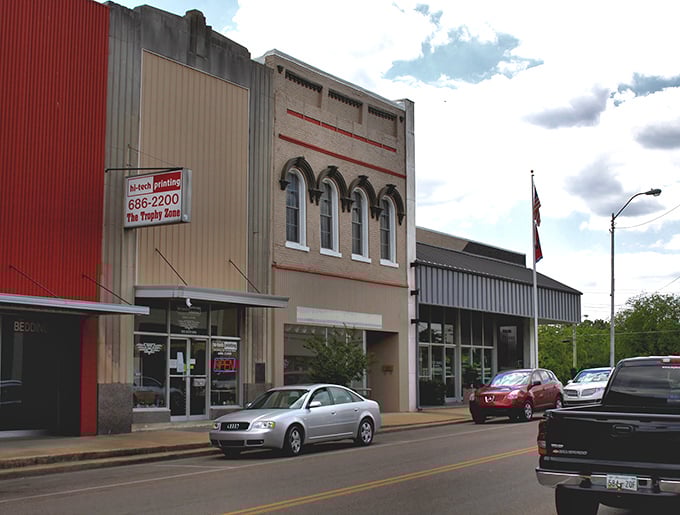 Milan's Madison Avenue stretches into the distance, lined with the kind of mom-and-pop storefronts that big box retailers can never replace.