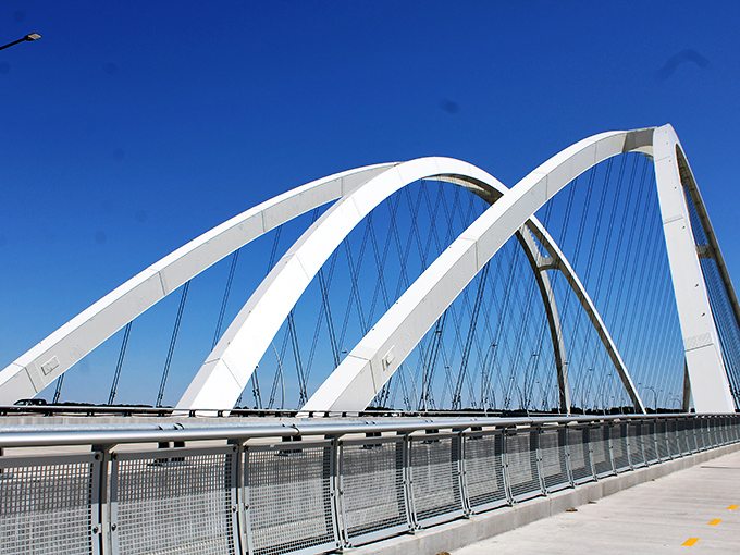 Moline's modern bridge arches gracefully across the Mississippi. Engineering that's both functional and beautiful&mdash;a rare combination these days!