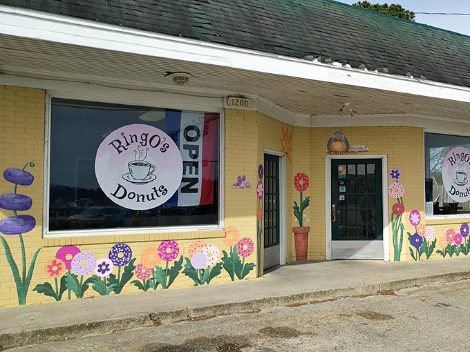 The hand-painted flowers at Ringo's Donuts bloom year-round, promising sweet treasures inside this Smithfield gem.