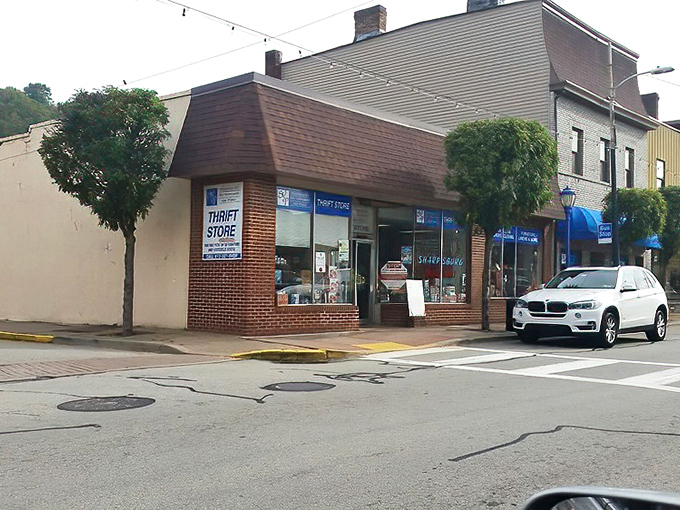 The corner thrift shop with the blue awning has been a Pittsburgh institution for decades. Small but mighty in the world of secondhand treasures.
