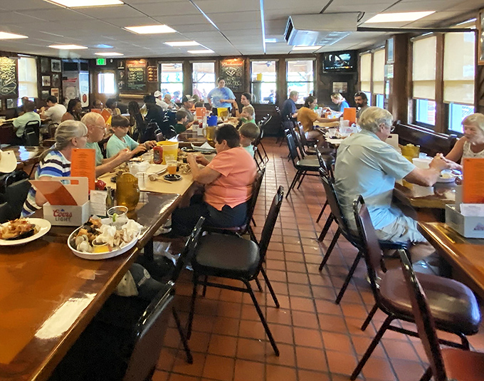 Happy diners dig into their feast, proving that messy hands equal the most memorable meals.