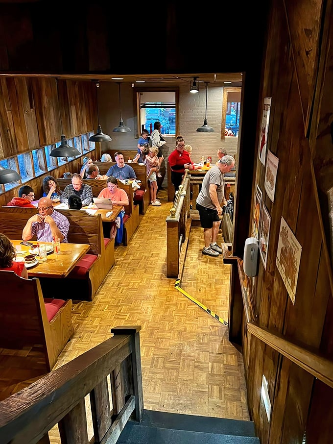 The cozy dining area proves great barbecue doesn't need fancy surroundings &ndash; just honest wood, comfortable seating, and the promise of flavor.