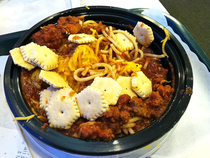 Cincinnati-style chili takes a southern vacation, bringing its signature spiced meat sauce over spaghetti with crackers standing by for the dip.