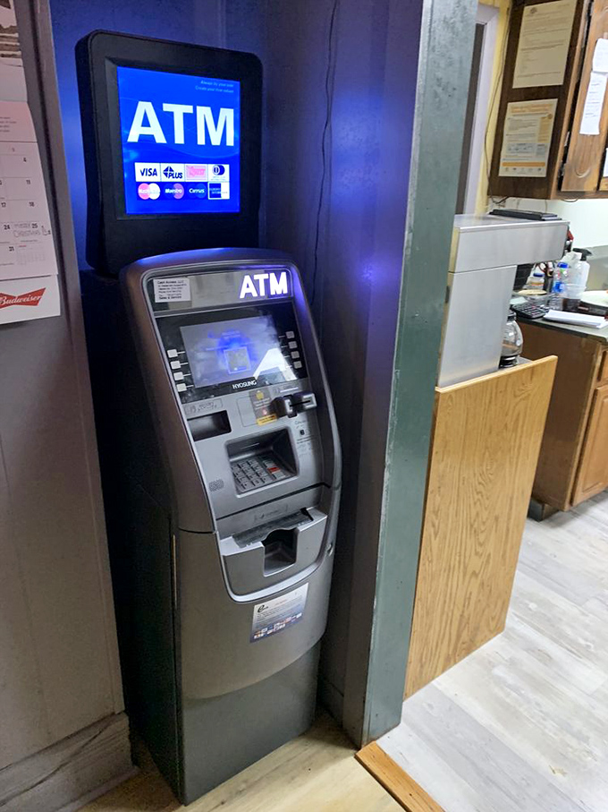 The ATM stands ready for the cash-only policy. In a world of digital everything, there's something refreshingly old-school about this commitment to simplicity.