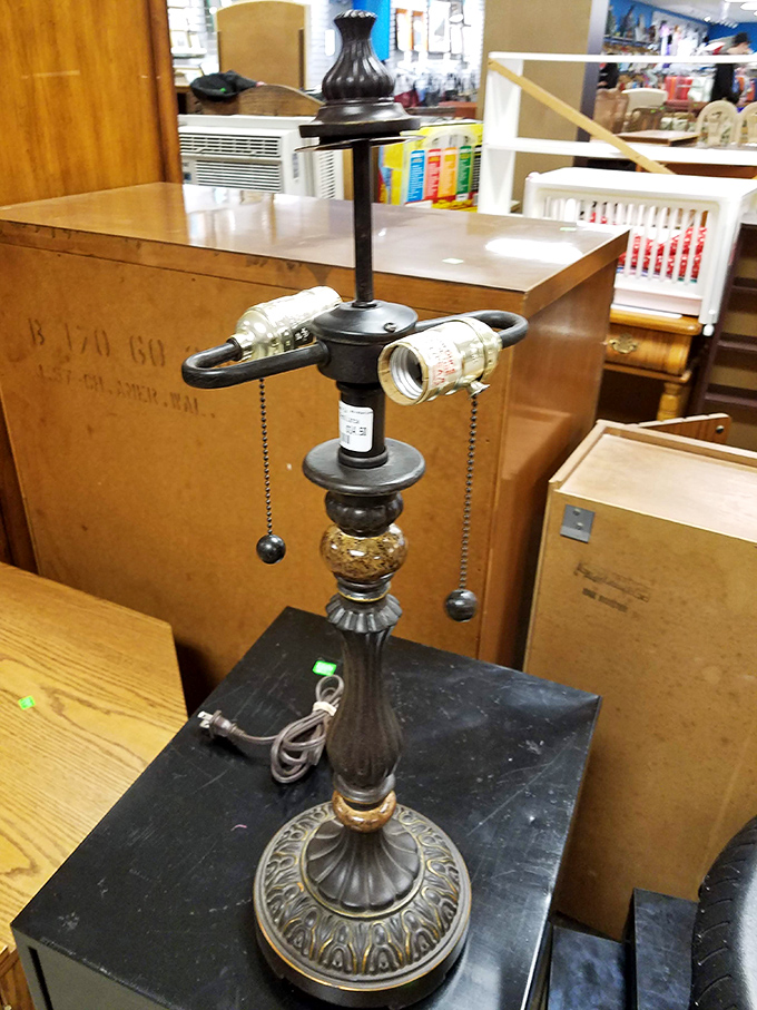 That's not just a vintage lamp&mdash;it's a conversation piece with history illuminating its metal curves, ready to light up someone's life again.