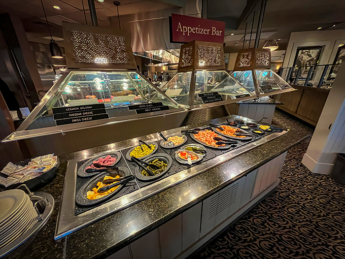 The appetizer bar stands ready like the starting line of a delicious marathon. Pace yourself, brave eater. 