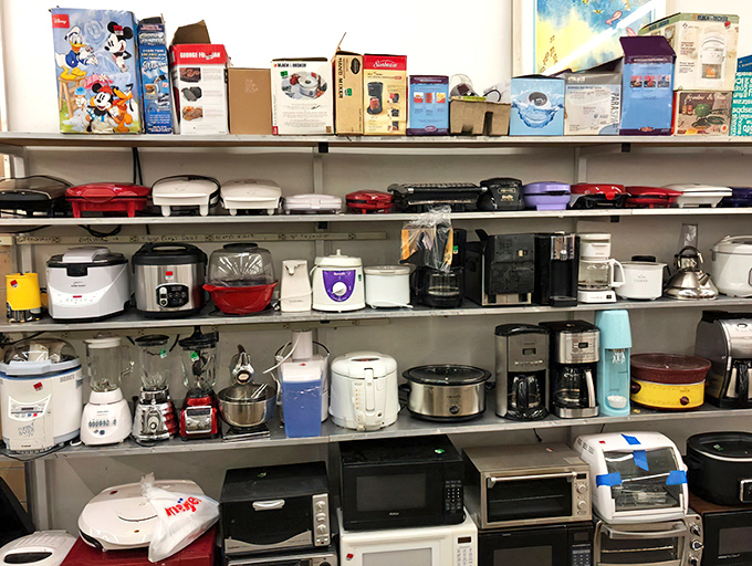 Kitchen gadget graveyard or culinary resurrection center? That Mickey waffle maker is begging for a second chance at breakfast glory.