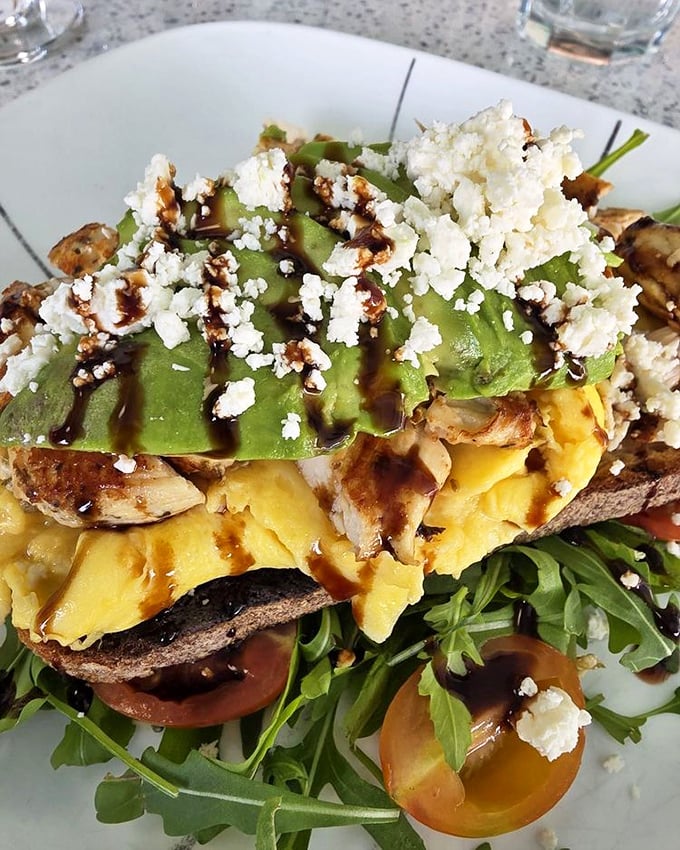 Avocado toast that elevates simple ingredients to art form status, with feta crumbles playing the role of edible confetti.