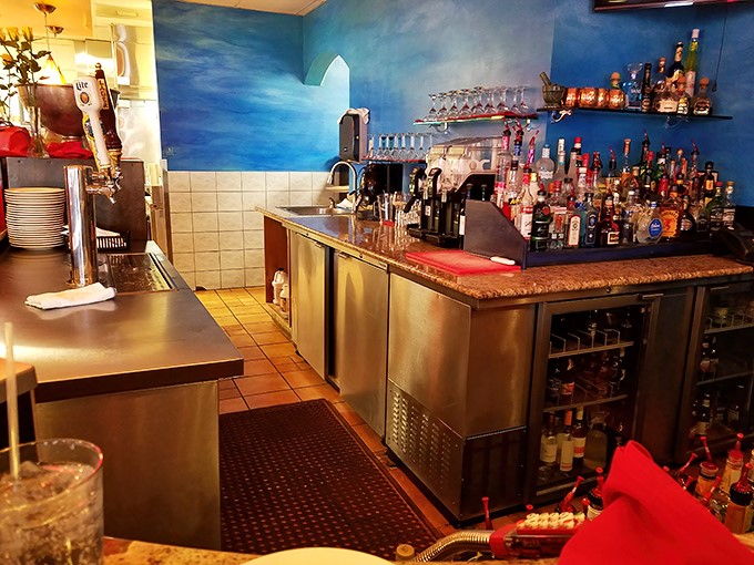 The bar at JoJo's isn't just a place to order drinks&mdash;it's where friendships are forged over Stella Artois and stories of the best pizza you've ever had.