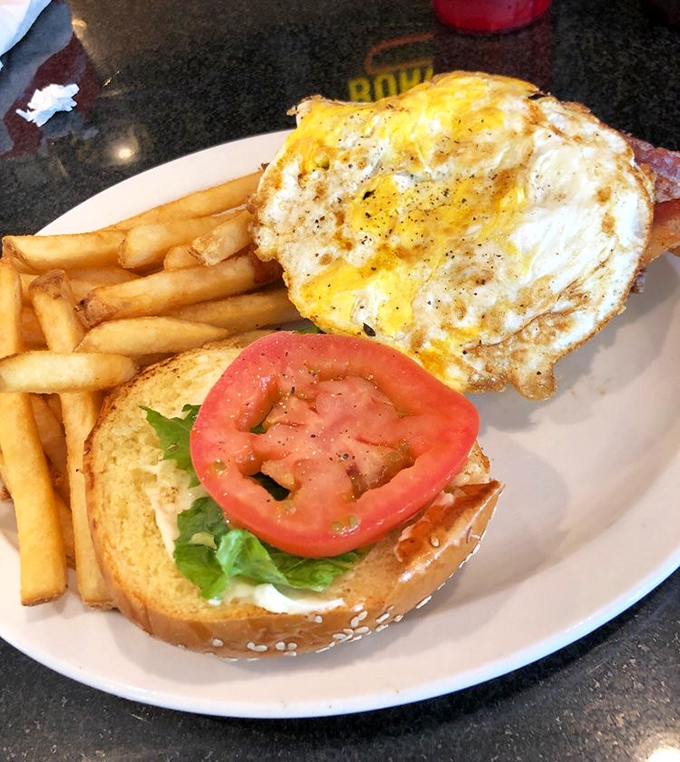 The open-faced sandwich that demands to be seen! With that perfectly fried egg on top, it's basically wearing a sunny hat to brunch.
