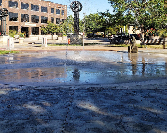 Downtown's splash plaza invites playful cooling off on hot Illinois days, with sculptural fountains turning practical relief into public art.