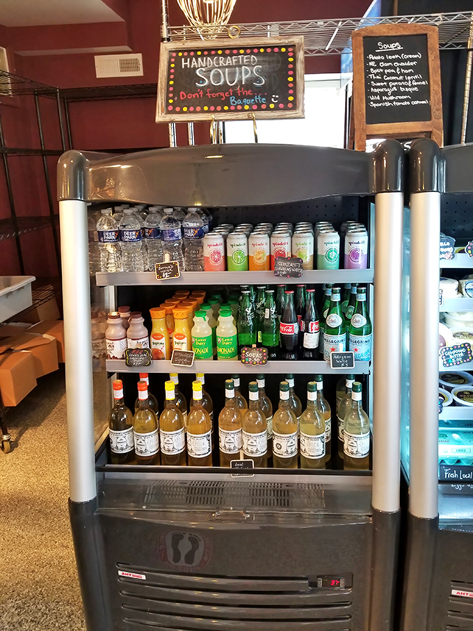 The "Handcrafted Soups" sign is just the opening act for this beverage ensemble—liquid refreshment for every possible mood.