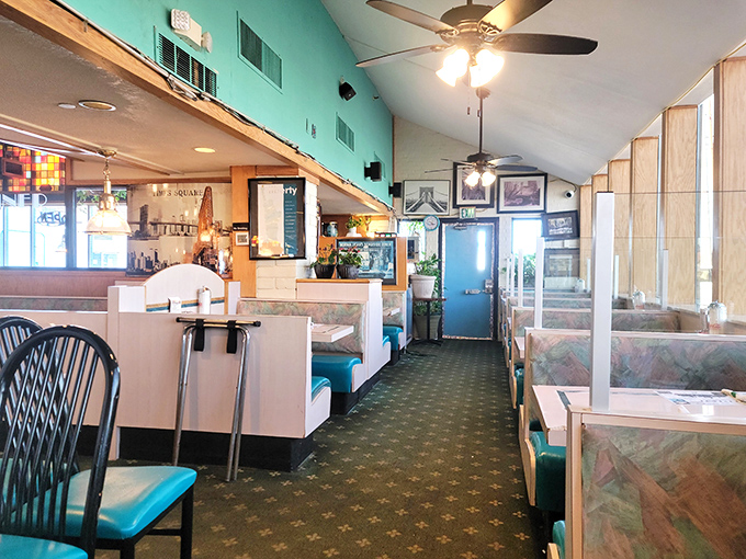 Classic diner booths where countless life decisions have been made over bottomless cups of coffee and plates of hash browns.