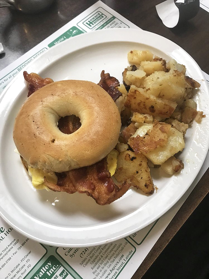 Breakfast sandwich perfection with home fries that deserve their own fan club. This plate makes Monday mornings significantly less offensive.