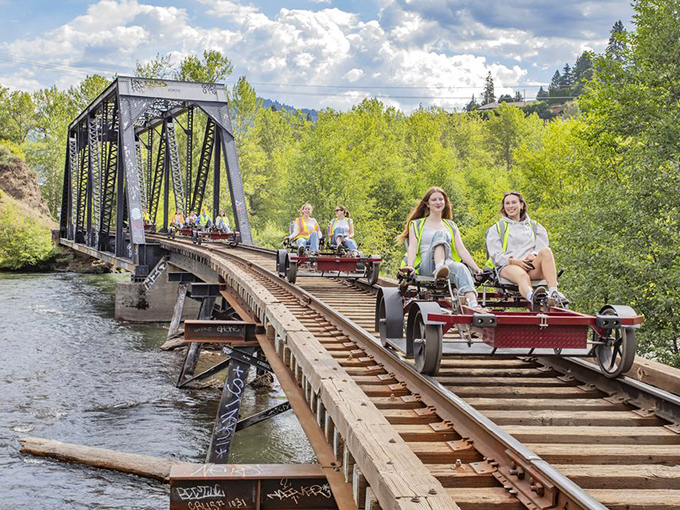 Engineering marvel meets natural wonder as railbikes cross this historic trestle bridge&mdash;a perfect metaphor for how the railroad connects travelers with Oregon's untamed beauty.