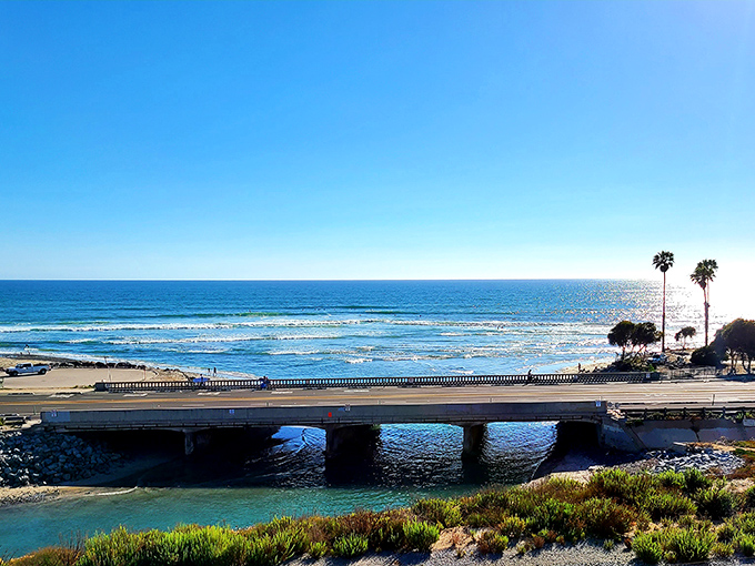 This bridge doesn't just connect two pieces of land&mdash;it frames the perfect postcard moment where ocean meets sky in a blue-on-blue embrace.
