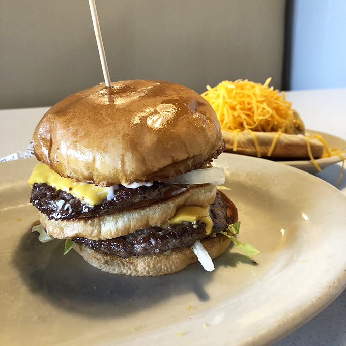 A burger that doesn't try to be trendy&mdash;just honest, hearty, and accompanied by its faithful sidekick: a cheese coney standing at attention.