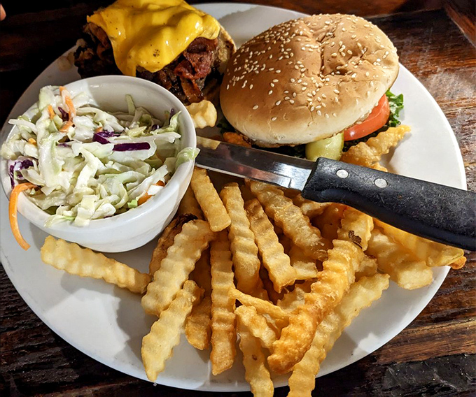 The burger proves the "& More" isn't just an afterthought. That coleslaw adds the perfect crunch to balance the savory richness.