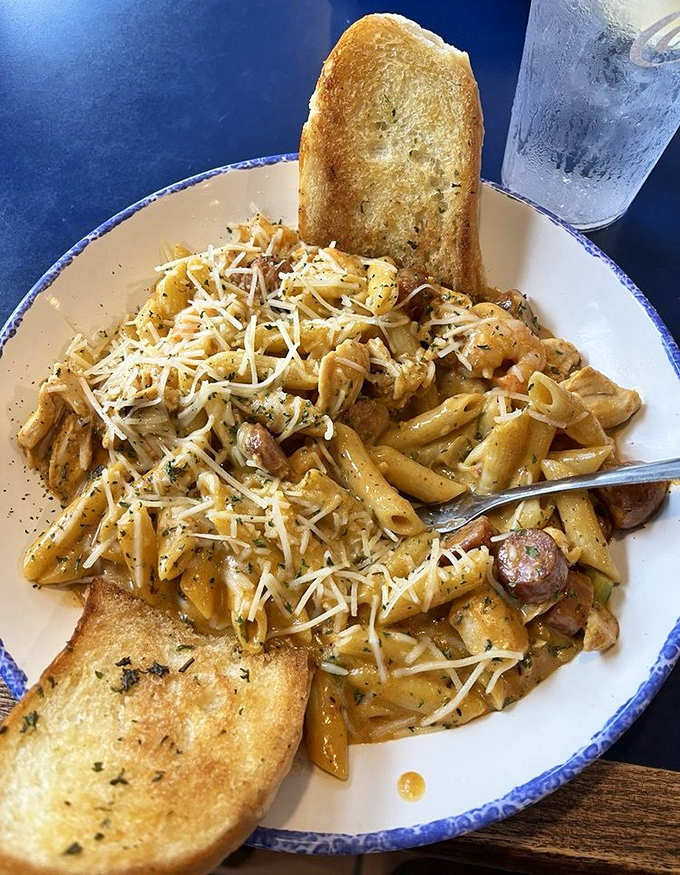 Who knew pasta could go to the beach? This Cajun chicken and shrimp pasta brings coastal flavor to Italian comfort food.
