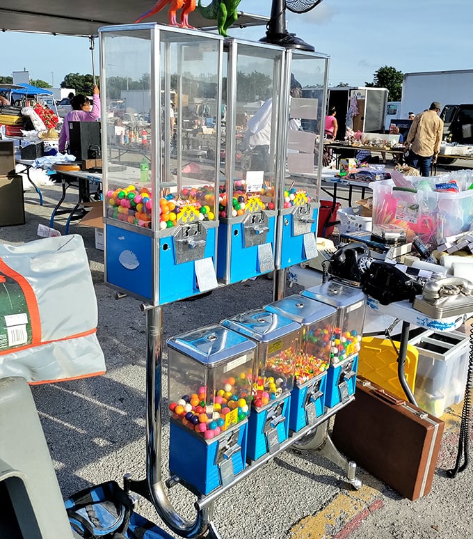 Childhood joy dispensed for quarters. These gumball machines stand like colorful sentinels, guarding the gateway to temporary dental fillings and sticky fingers.