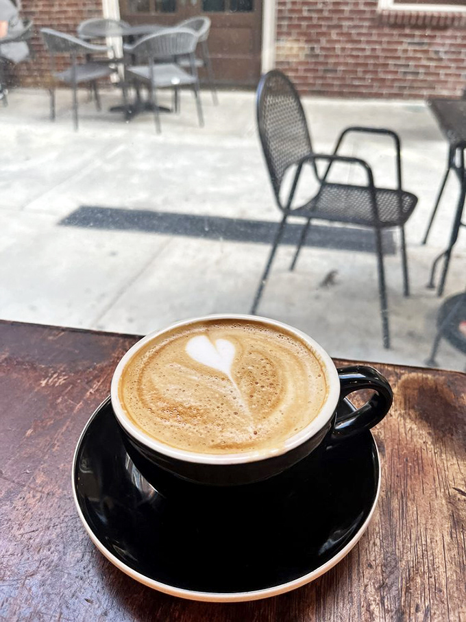 A cappuccino with latte art so pretty you almost don't want to drink it. Almost.