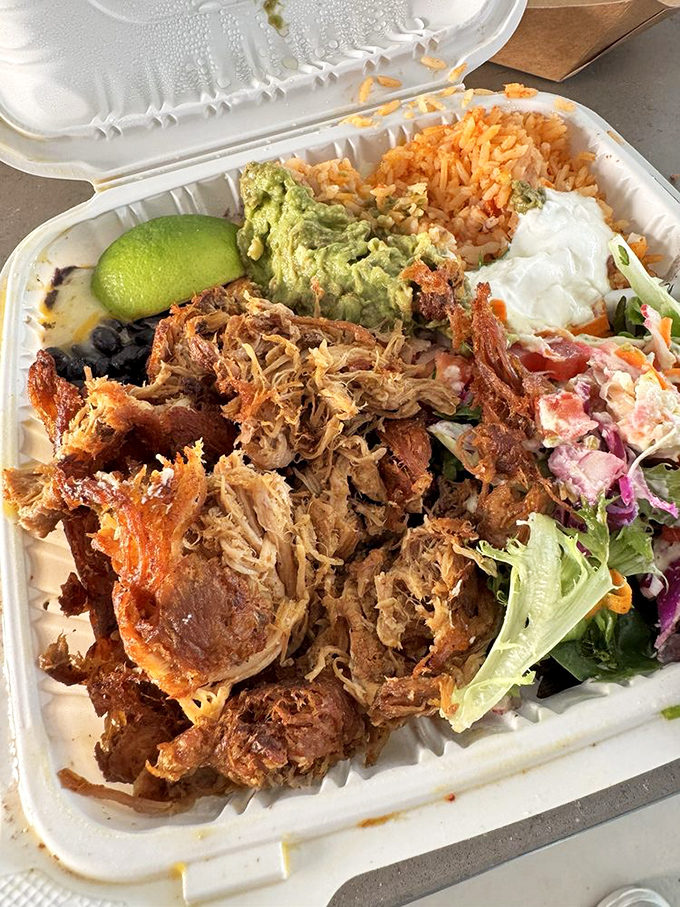 This carnitas platter isn't just a meal&mdash;it's a commitment. The kind of food that demands you cancel your next appointment.