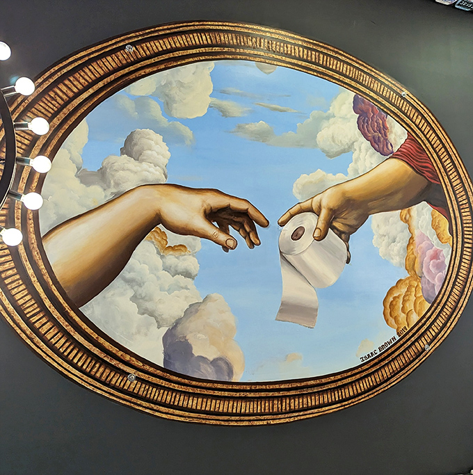The ceiling's Sistine Chapel-inspired artwork features hands exchanging toilet paper instead of the spark of creation. Divine bathroom humor at its finest.