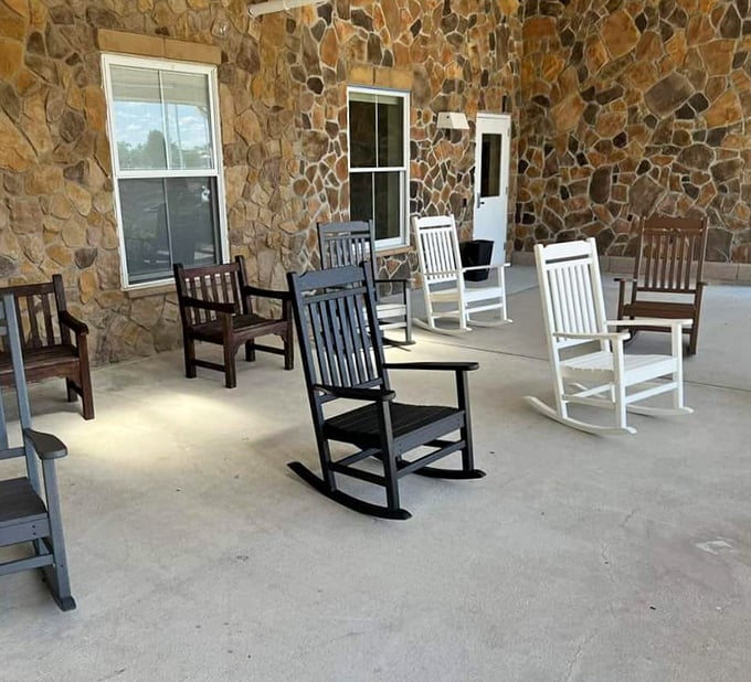 The rocking chair porch display&mdash;where strangers become neighbors and every chair has already heard thousands of stories.