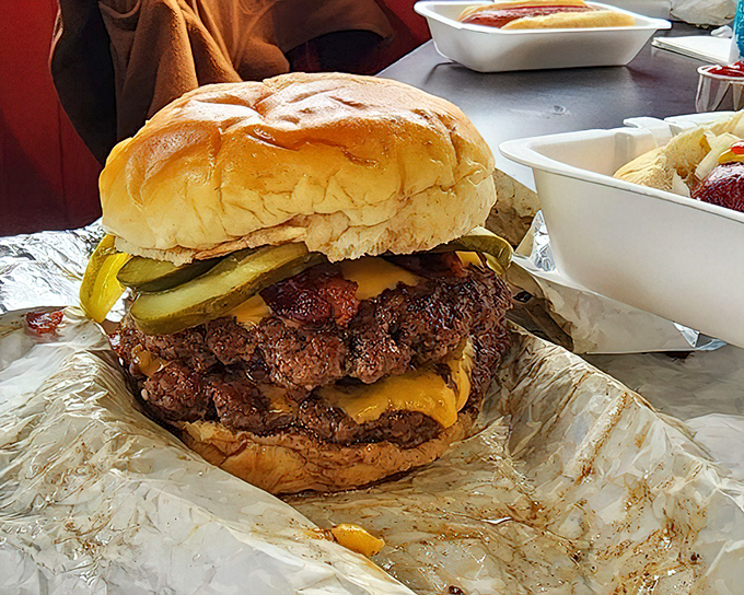 This isn't just a burger&mdash;it's a monument to excess done right. Two patties, melty cheese, and pickles for that perfect tang.