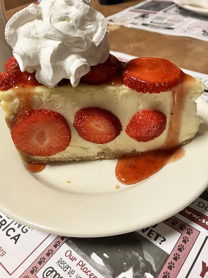 Strawberry cheesecake that makes you question why people bother with birthday cake when this masterpiece exists in the world.