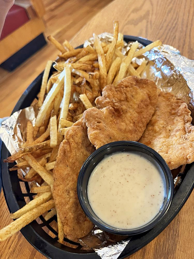 Chicken tenders that actually deserve the name "tender." Crispy outside, juicy inside, with fresh-cut fries that put fast food to shame.