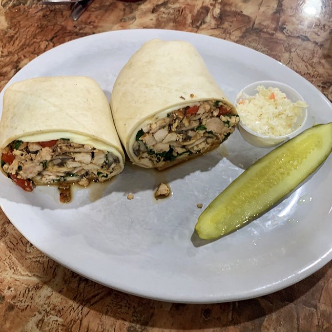 This wrap isn't just stuffed&mdash;it's having an existential crisis about containing all that chicken, veggies, and flavor in one tortilla.