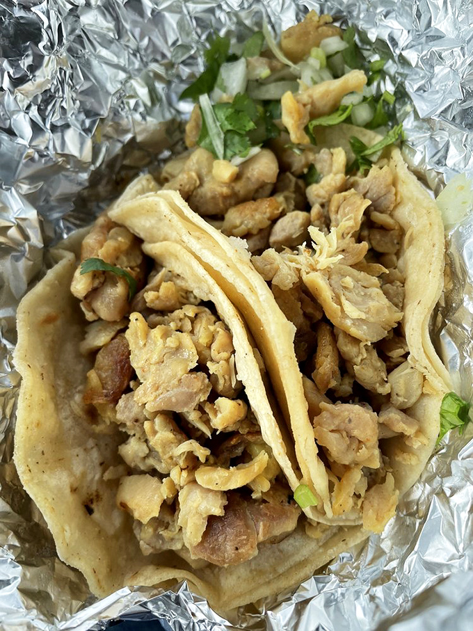 Chicken tacos so perfectly seasoned, they make you wonder why anyone ever bothered inventing complicated food in the first place.