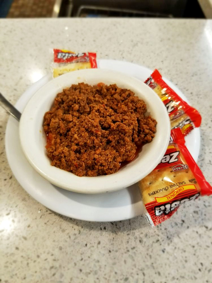 A humble bowl of chili served with crackers&mdash;proof that sometimes the simplest pleasures deliver the most profound satisfaction.