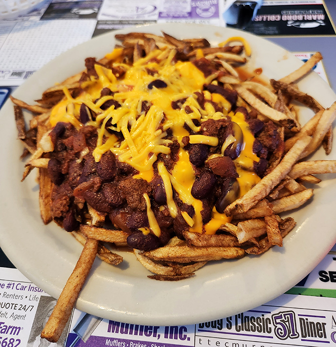 Chili cheese fries: where the laws of physics dictate that calories consumed while the cheese is still bubbling don't actually count.